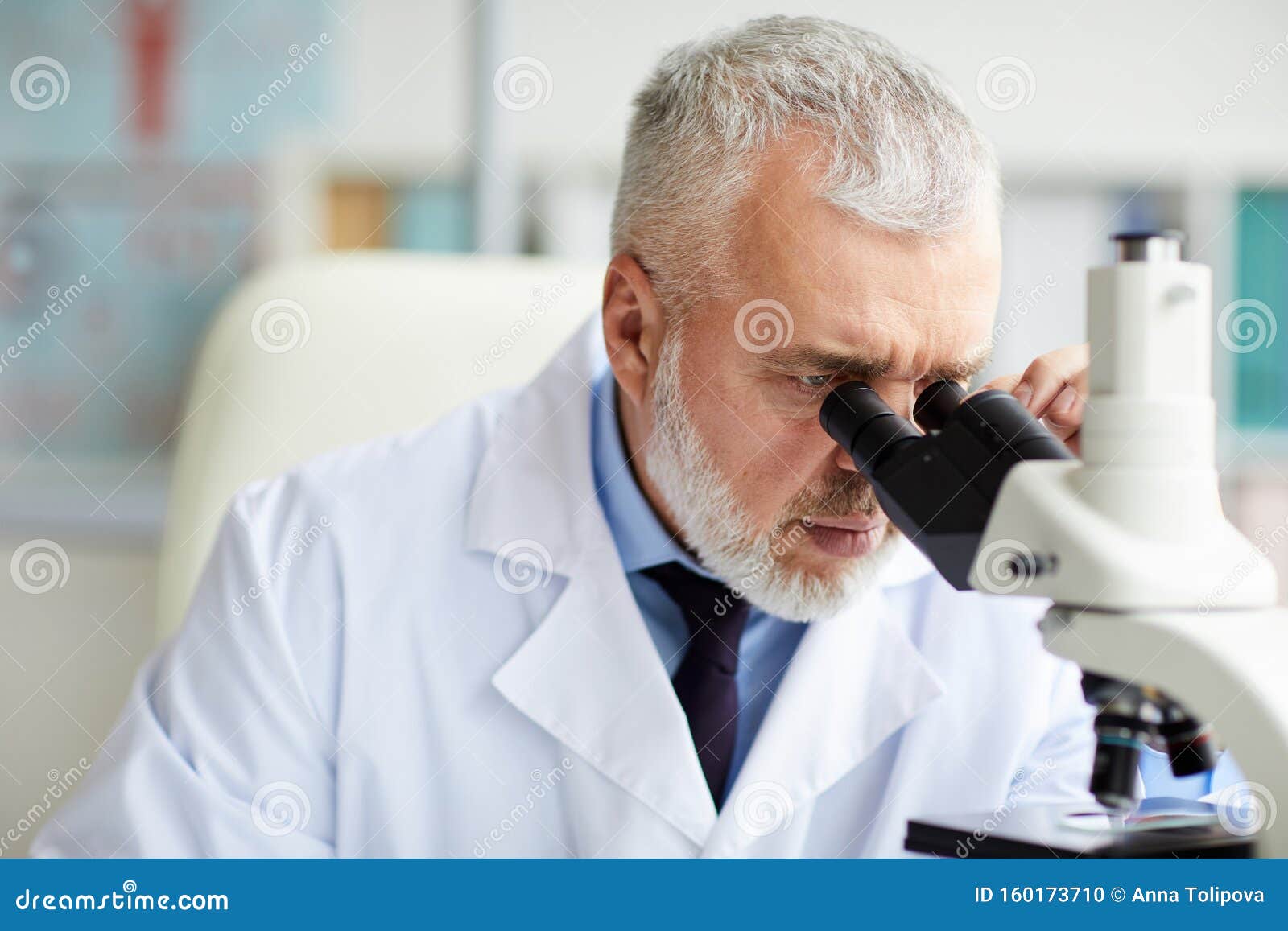 Doctor Working with Microscope at Office Stock Photo - Image of clinic ...