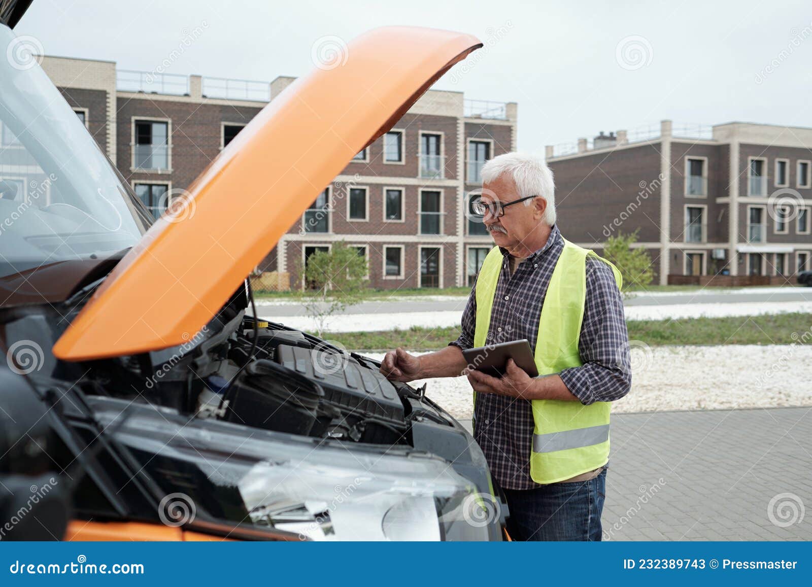 Senior Driver of Bus Looking at Engine while Checking it Stock Image ...