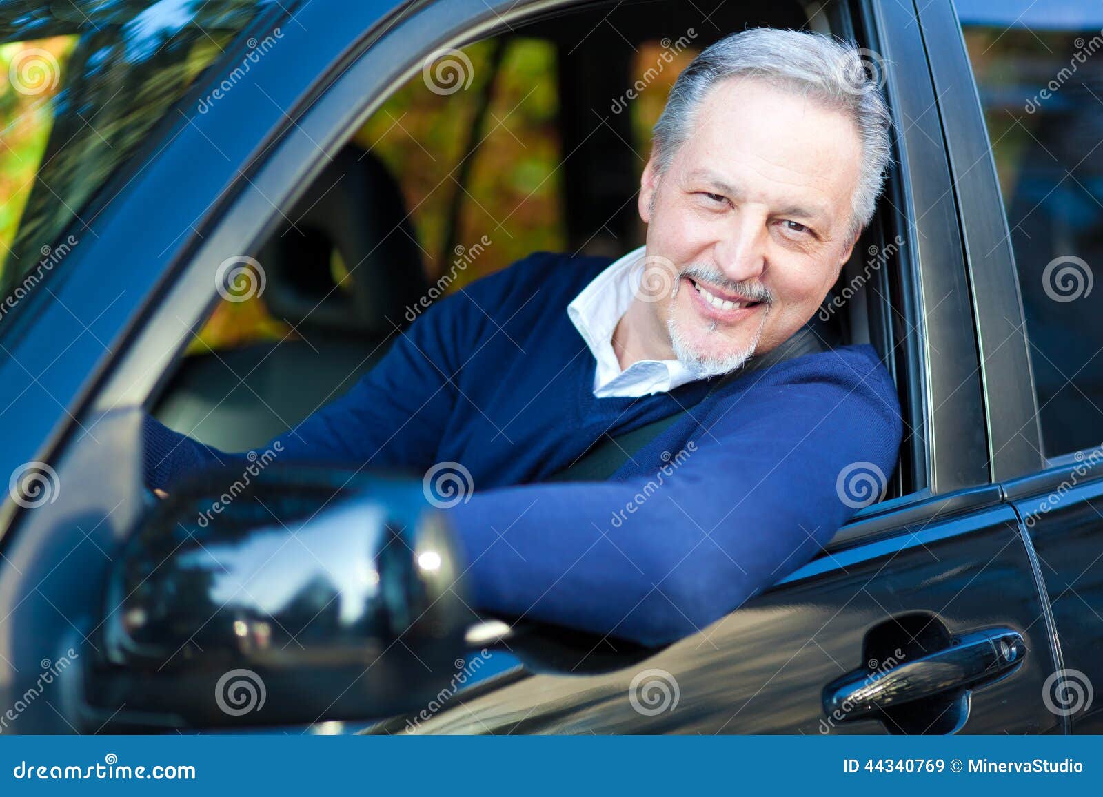 Senior driving his car stock image. Image of motor, belt - 44340769