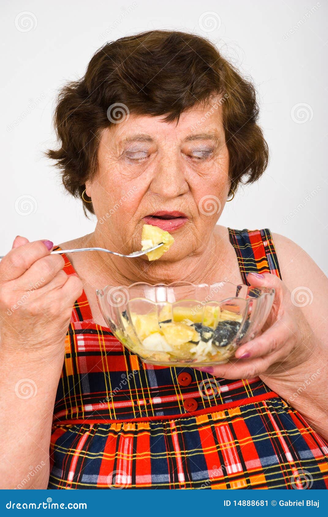 Senior eating potato salad stock image. Image of bowl - 14888681