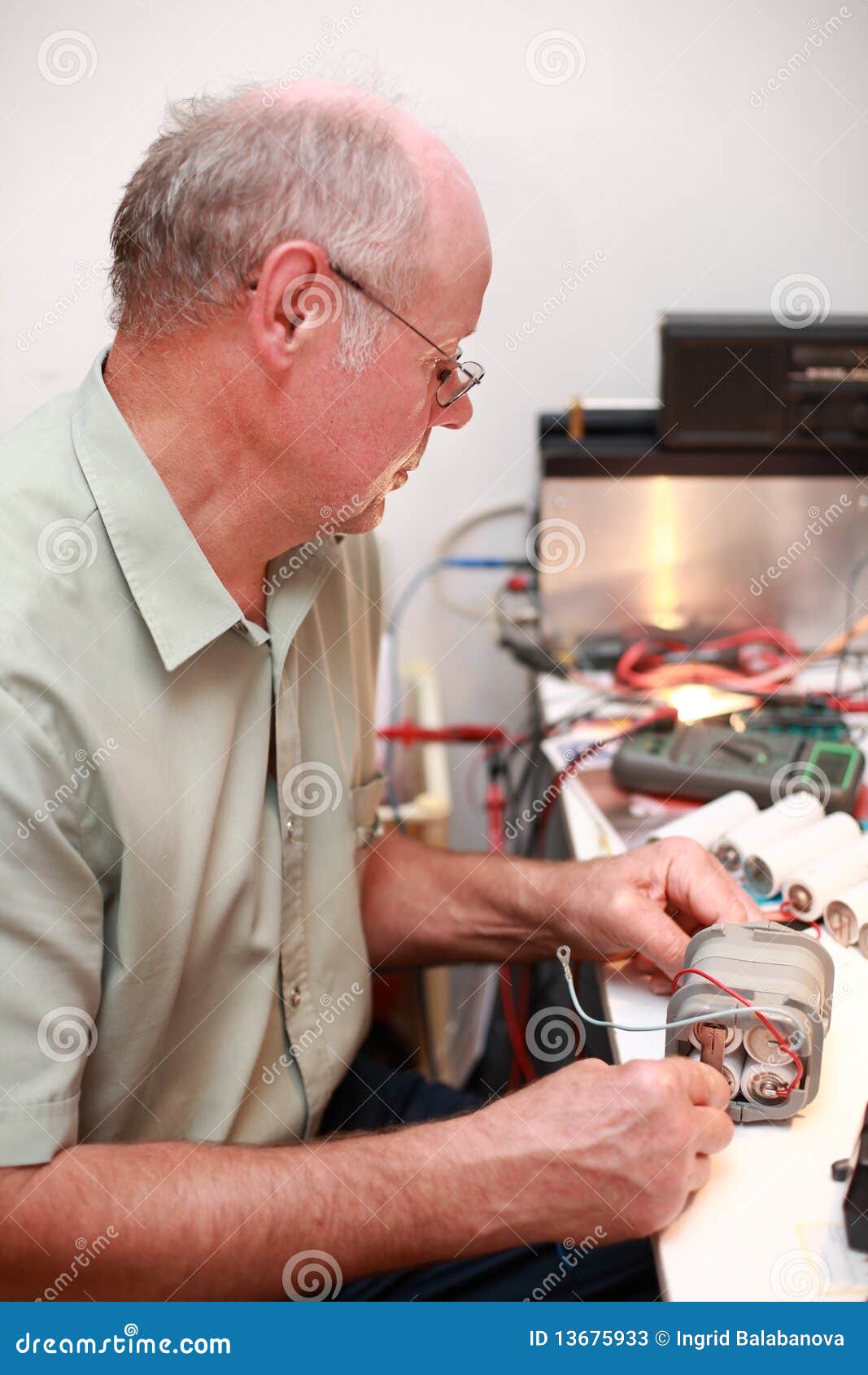 Senior electrician stock image. Image of repair, action - 13675933