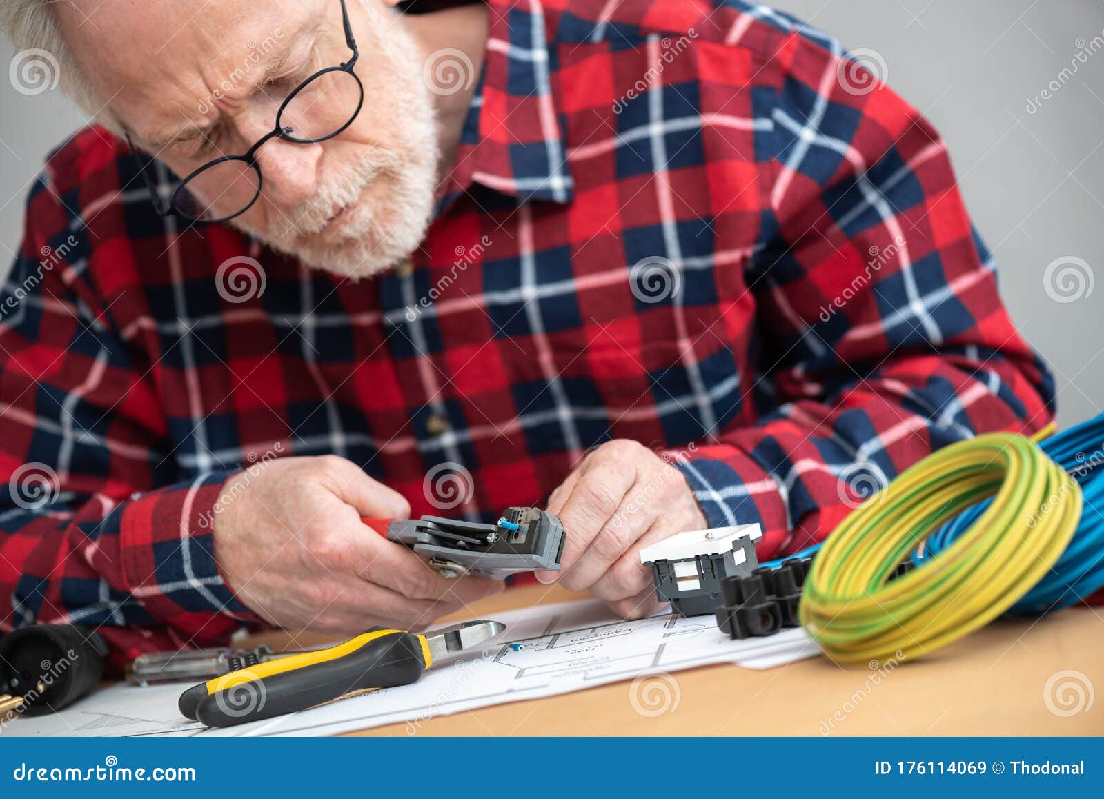 Electrician Stripping a Wire Stock Image - Image of professional, hand ...