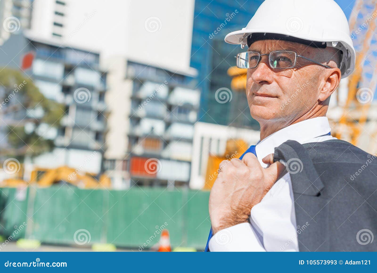 Senior Elegant Builder Man in Suit at Construction Site on Sunny Summer ...