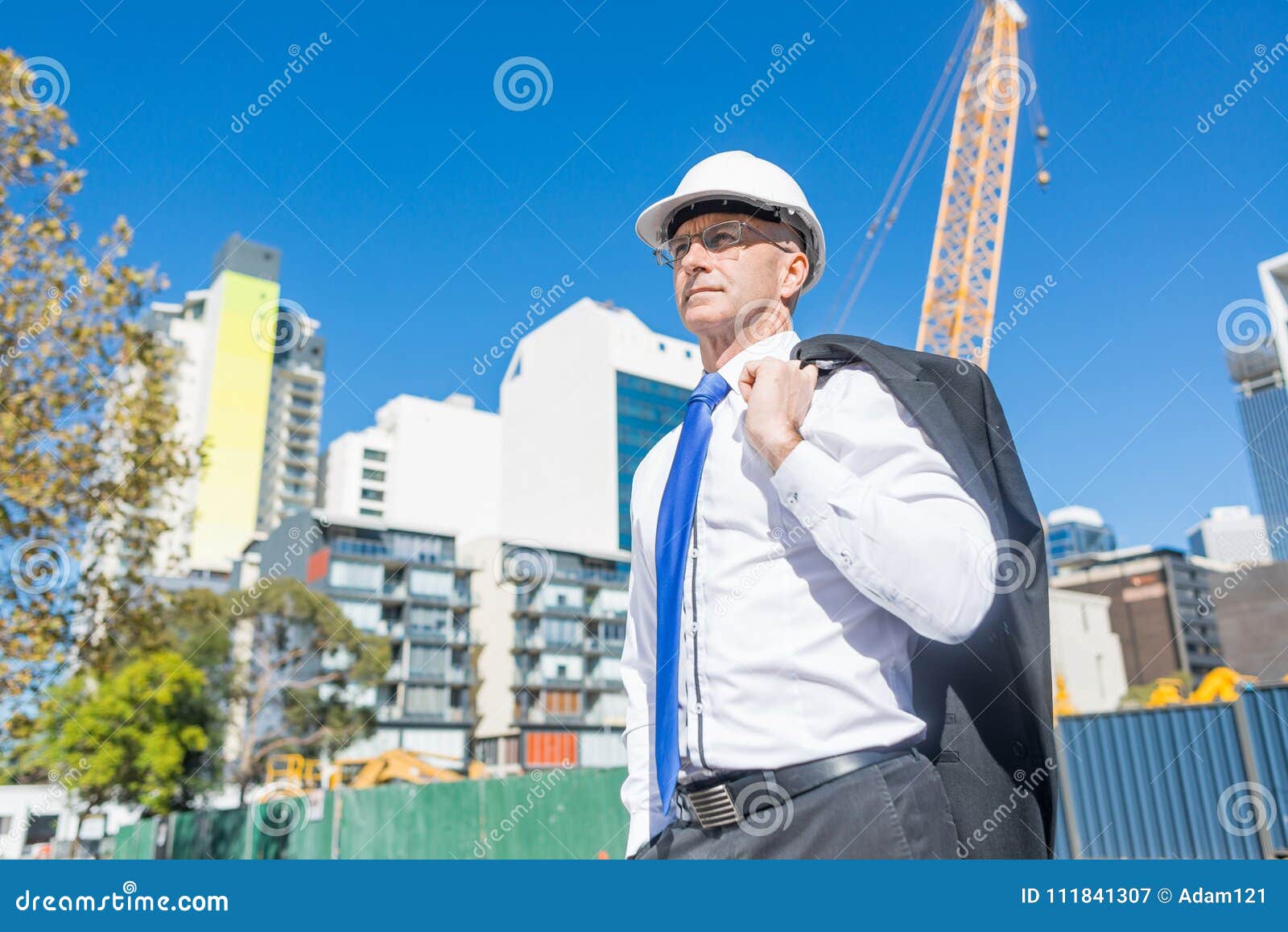 Senior Elegant Builder Man in Suit at Construction Site on Sunny Summer ...