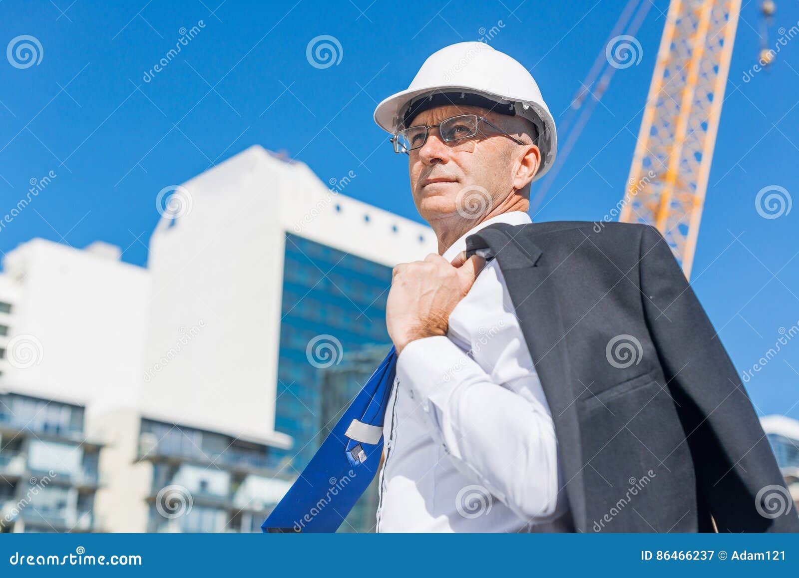 Senior Elegant Builder Man in Suit at Construction Site on Sunny Summer ...
