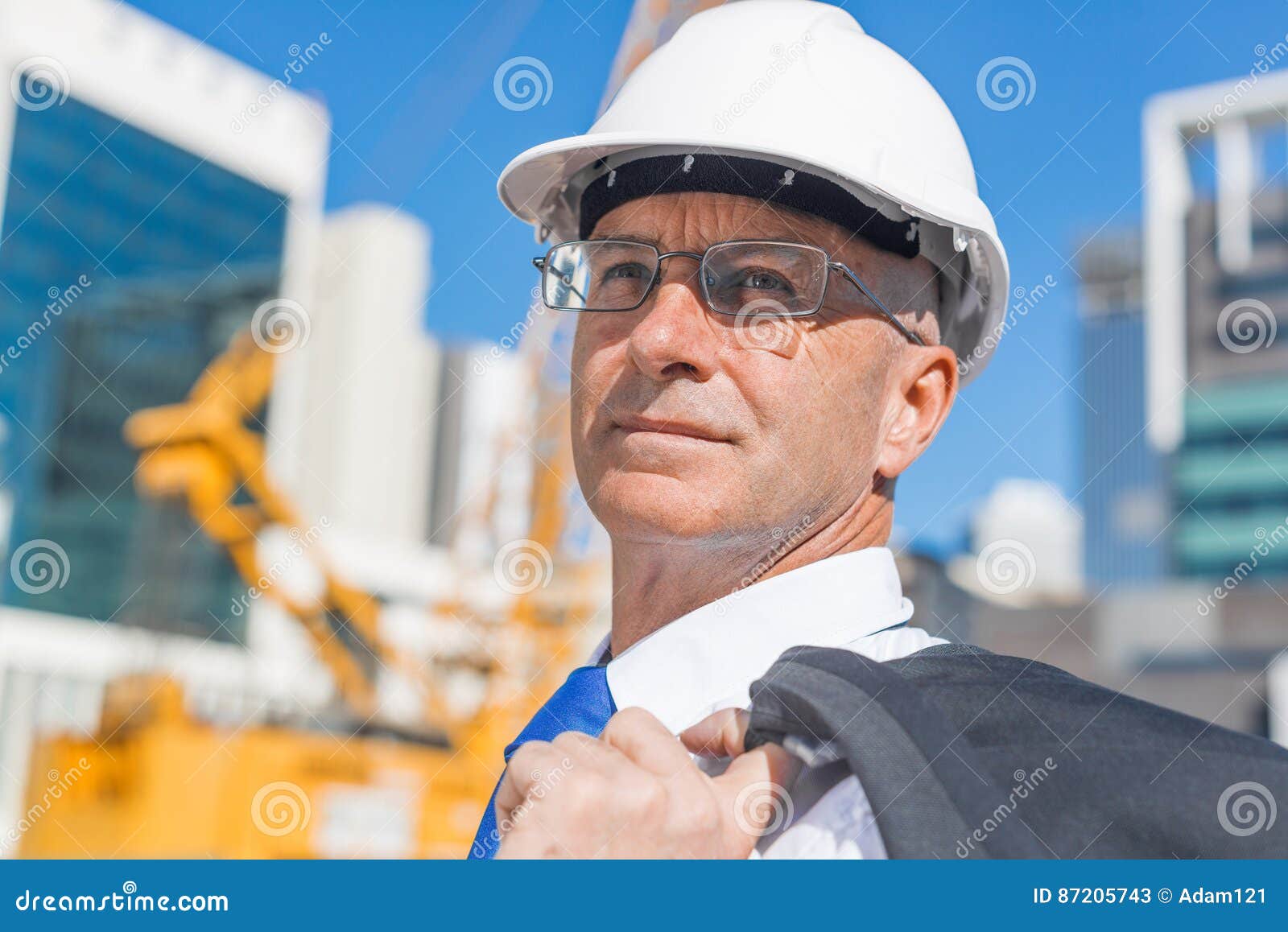 Senior Elegant Builder Man in Suit at Construction Site on Sunny Summer ...