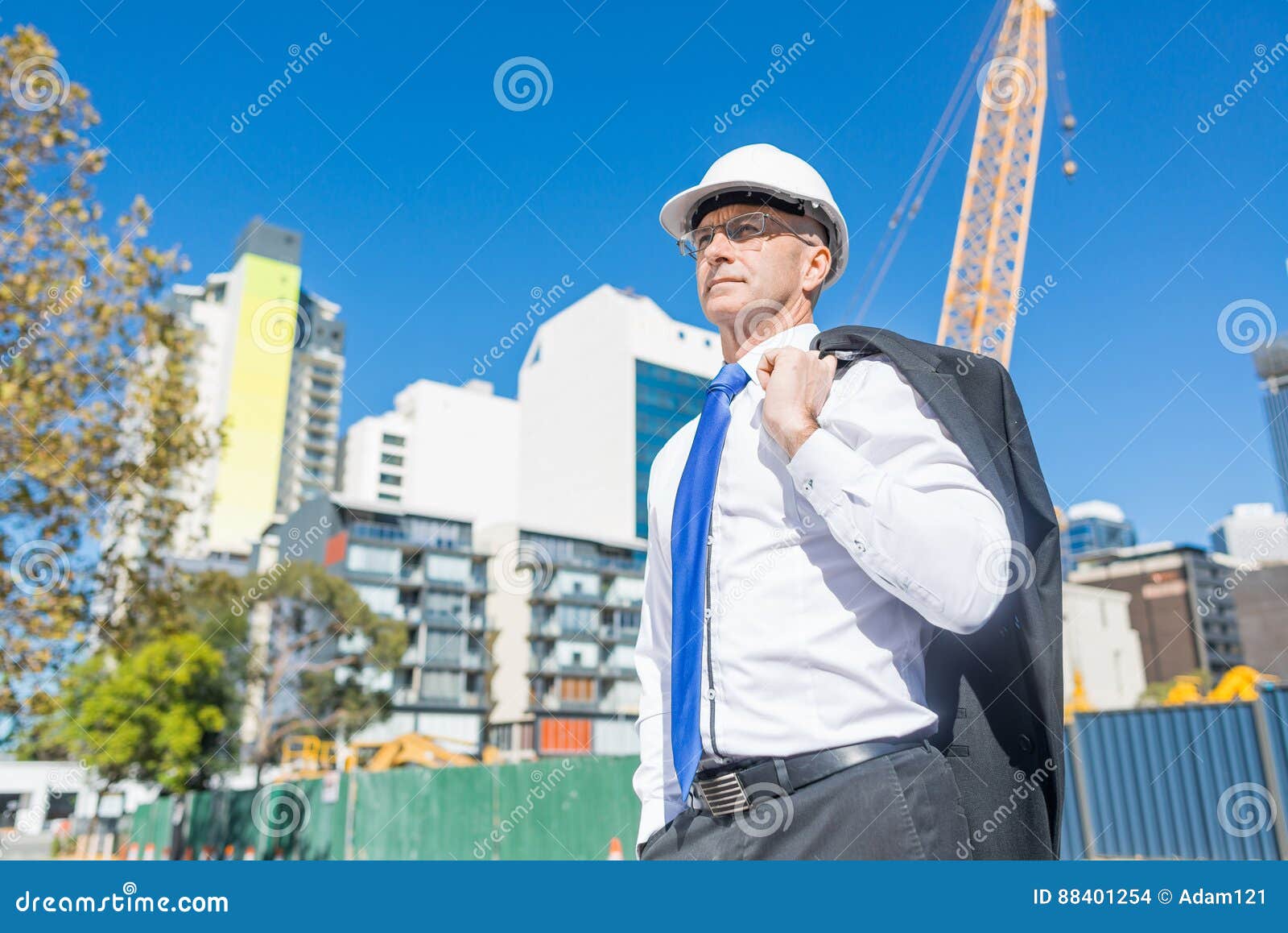 Senior Elegant Builder Man in Suit at Construction Site on Sunny Summer ...