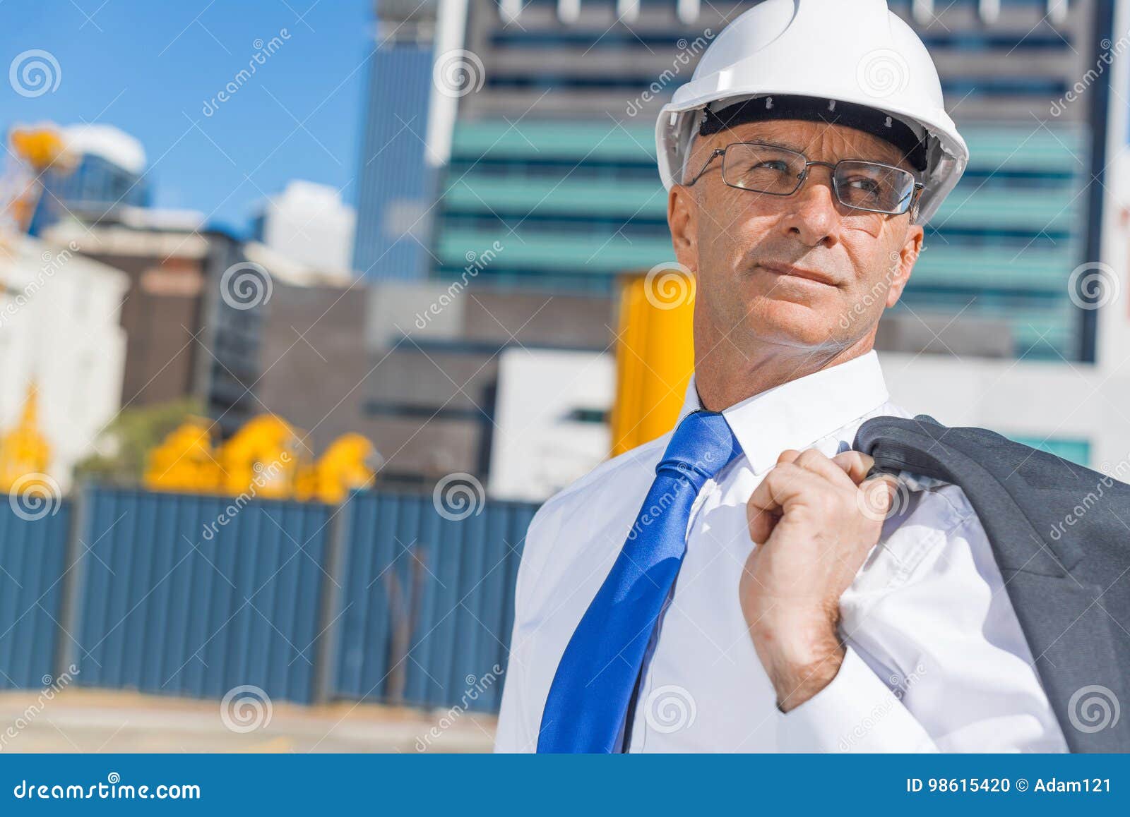 Senior Elegant Builder Man in Suit at Construction Site on Sunny Summer ...