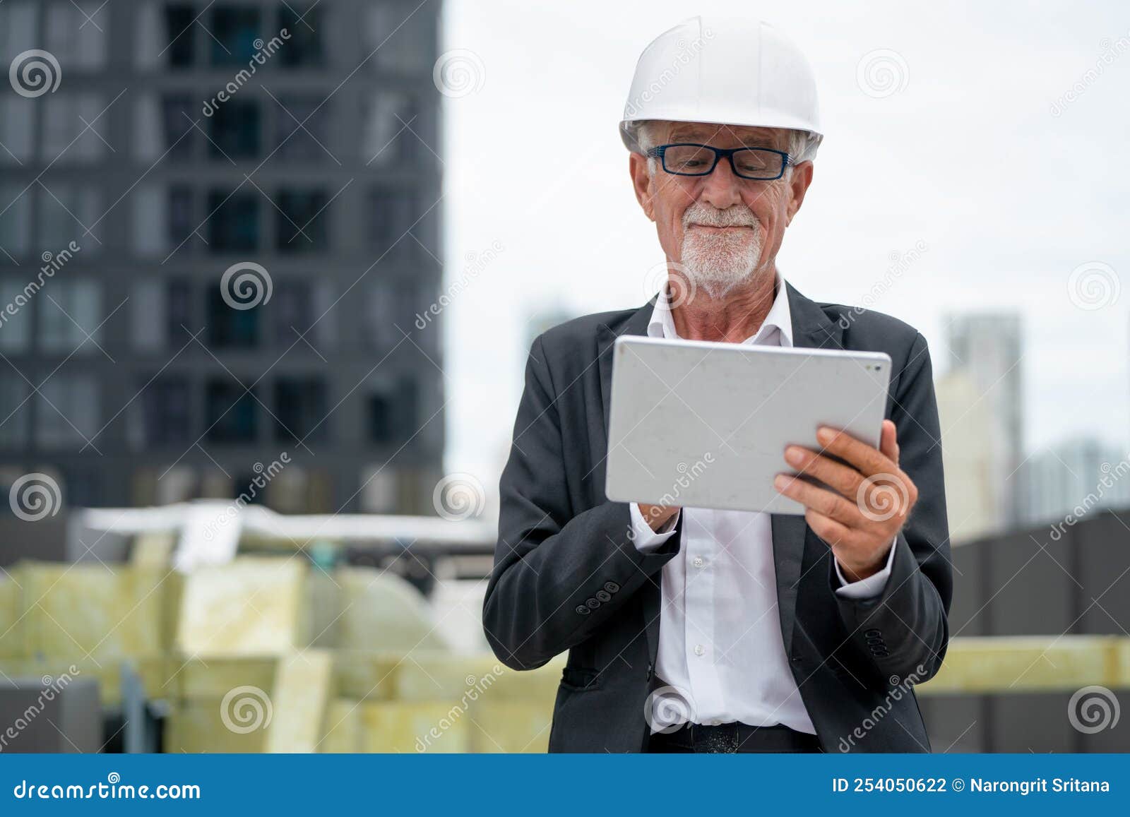 Senior Engineer Man with Smiling Hold Tablet for His Work at ...