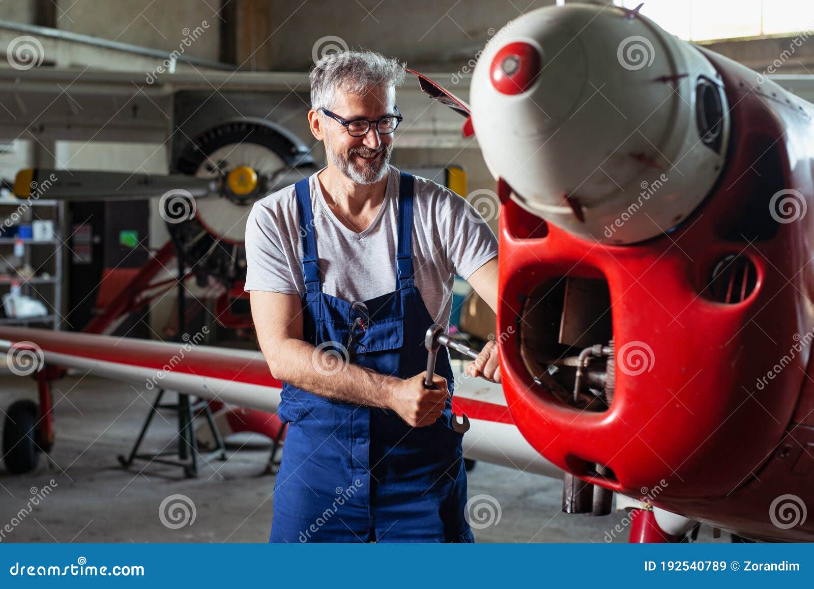 Senior Engineer Repairing Aircraft Engine Stock Image - Image of safety ...