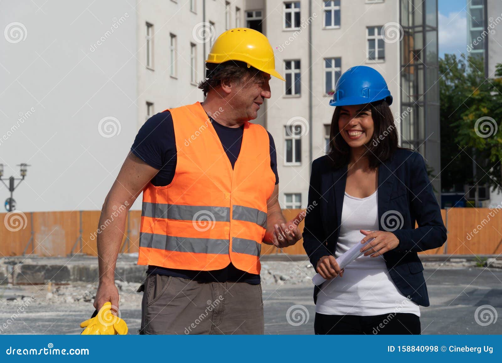 Foreman and Engineer on Construction Site Stock Photo - Image of ...