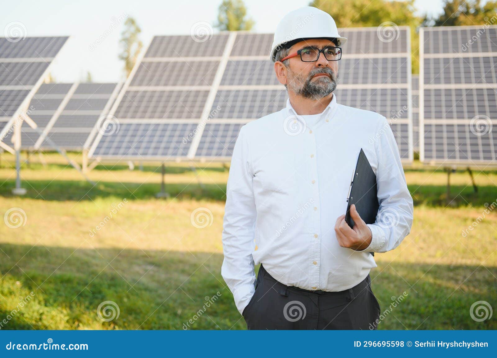 Senior Engineer Working on Solar Panel Farm. the Concept of Green ...