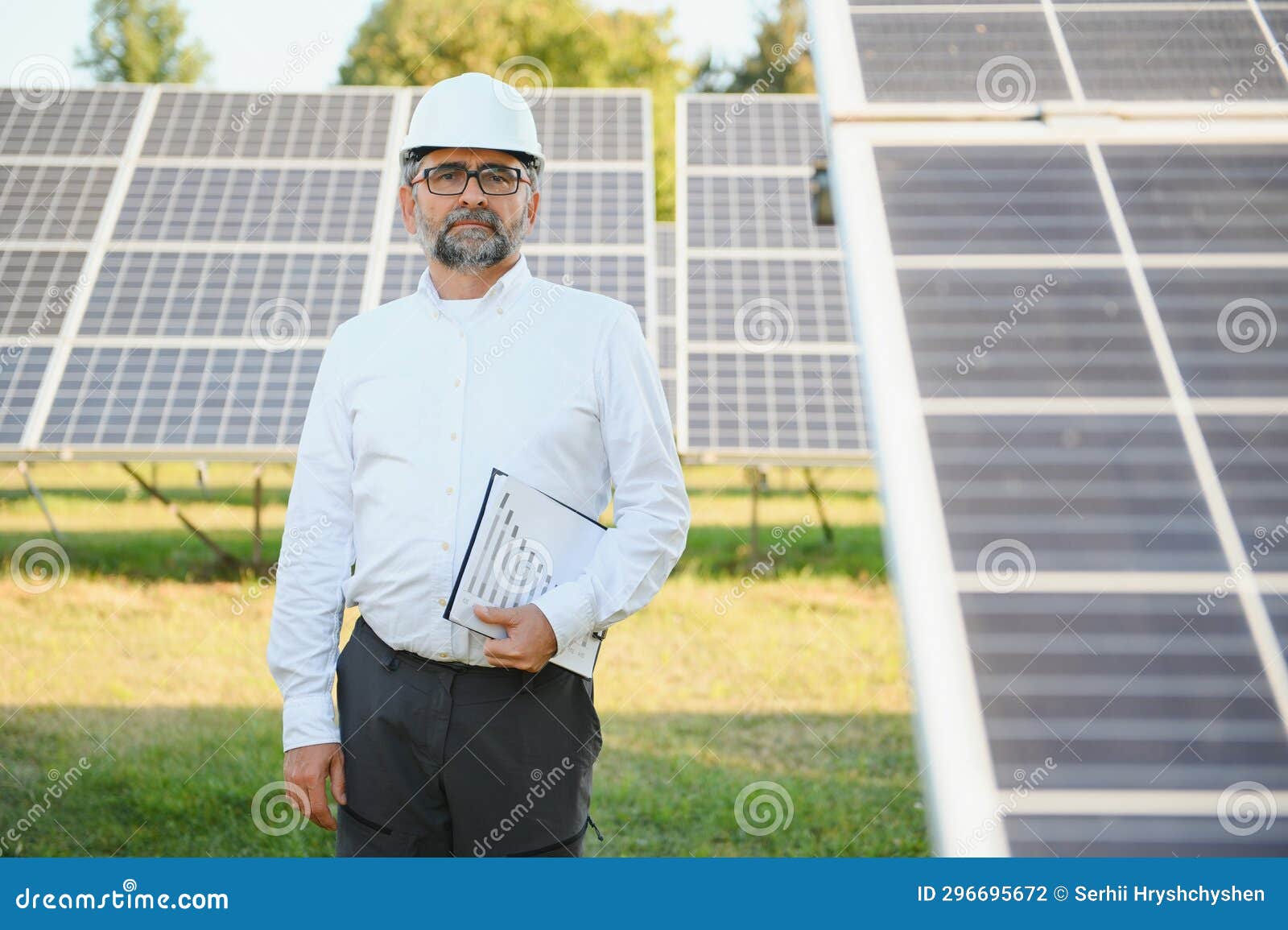Senior Engineer Working on Solar Panel Farm. the Concept of Green ...