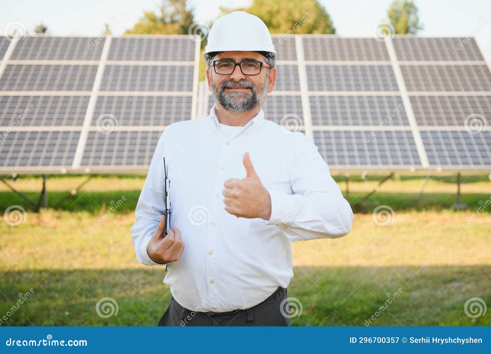 Senior Engineer Working on Solar Panel Farm. the Concept of Green ...