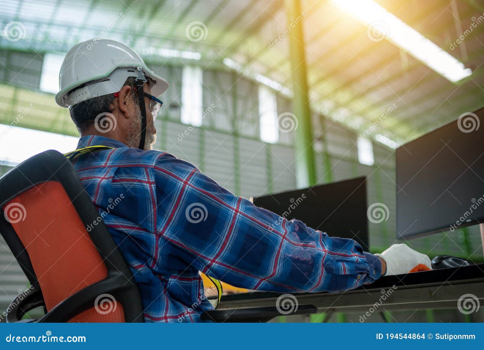 Senior Engineering Working in the Office with the Computer for Using ...