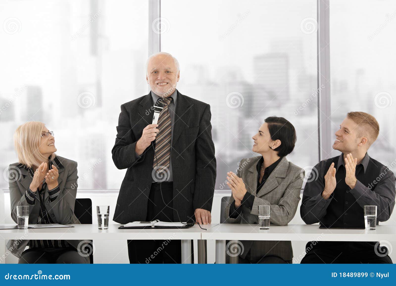 Senior Executive Speaking, Colleagues Clapping Stock Image - Image of ...