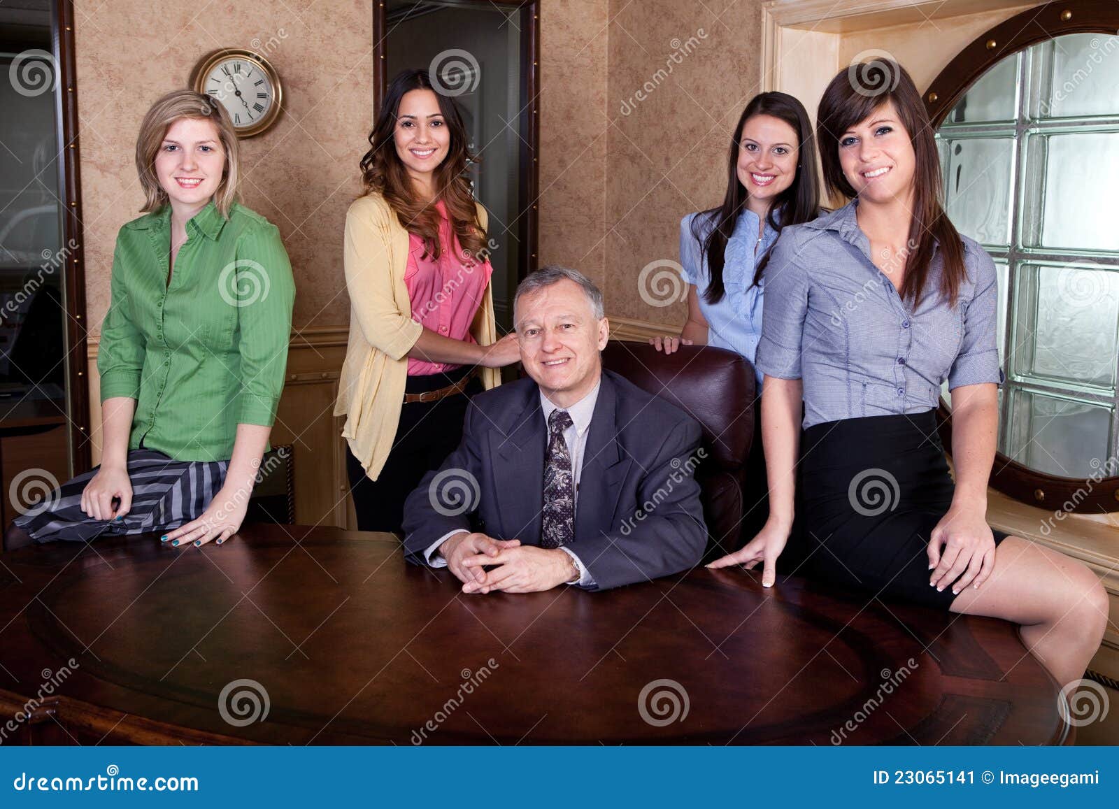 Senior Executive with Team of Young Women Stock Image - Image of angels ...
