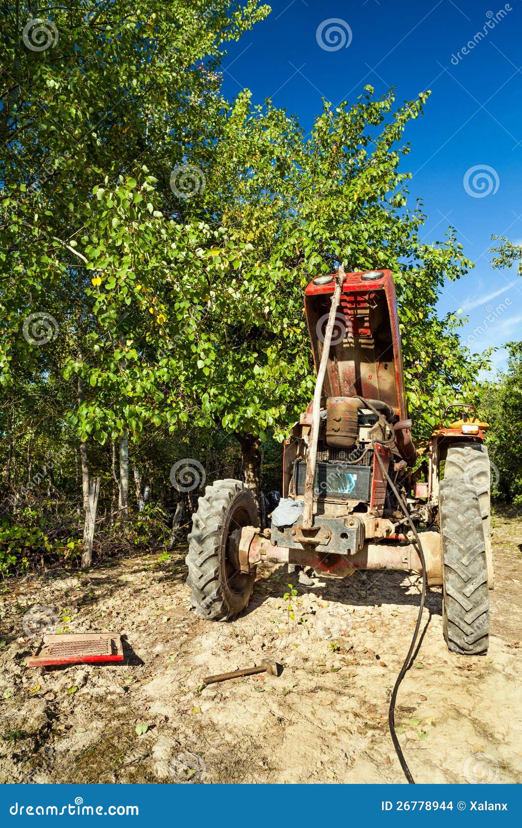 Senior Farmer Repairing His Tractor Stock Photo - Image of outdoor ...