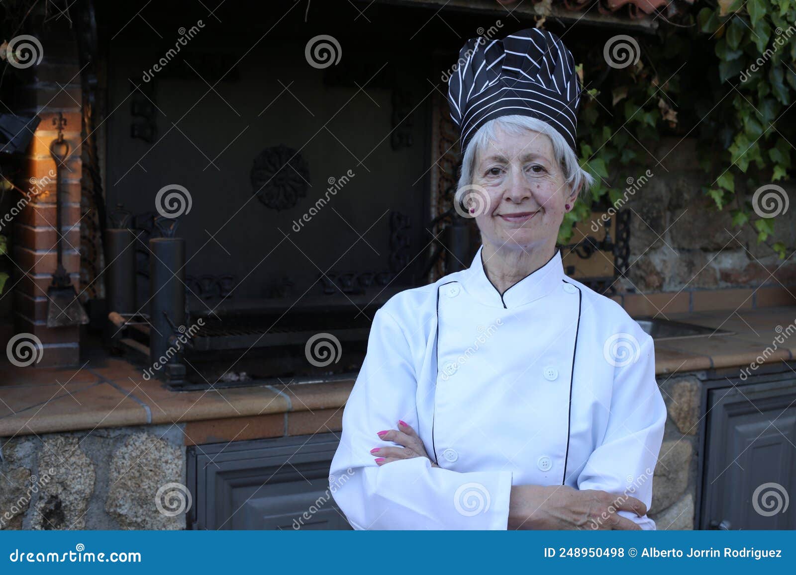 Senior Female Chef in Traditional Uniform Stock Photo - Image of ...