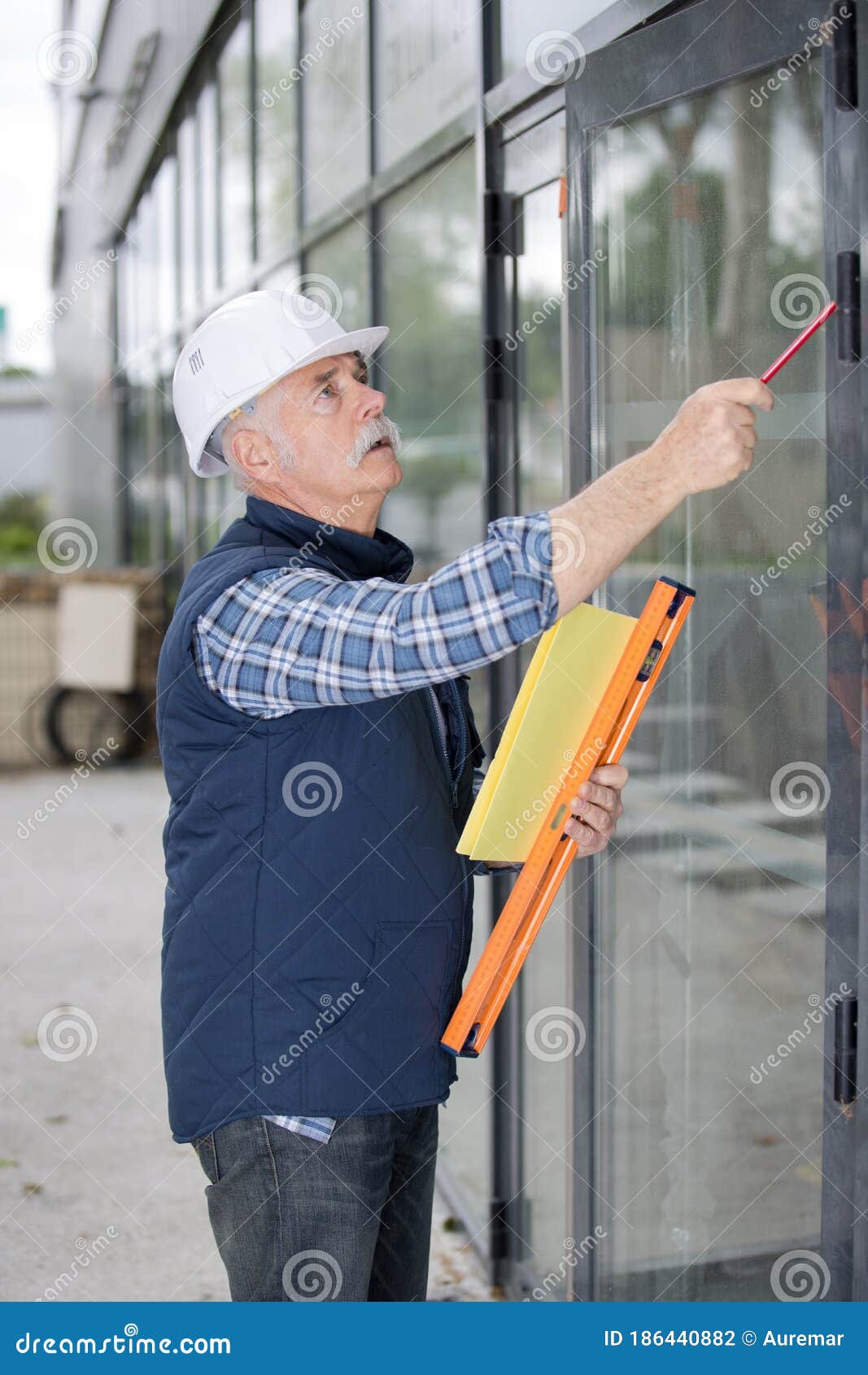 Senior Foreman Checking List Of Vehicle Repair Service While Two ...