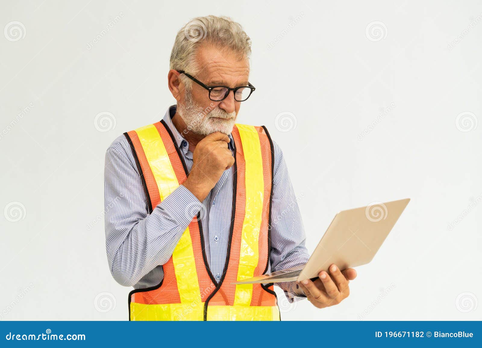 Senior Foreman or Engineer Using Laptop Computer. Stock Photo - Image ...