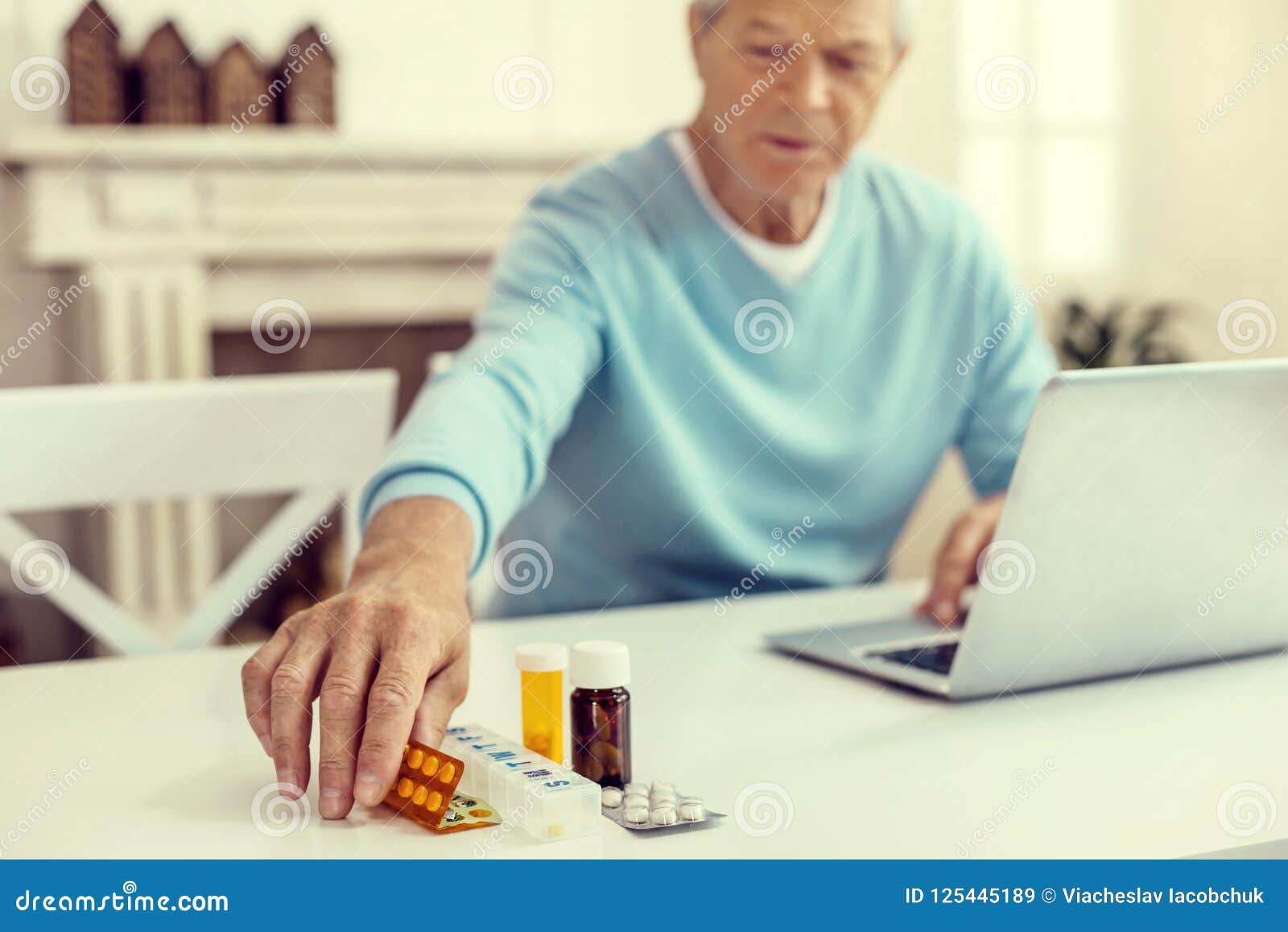 Senior Gentleman Taking His Pills at Table Stock Image - Image of ...