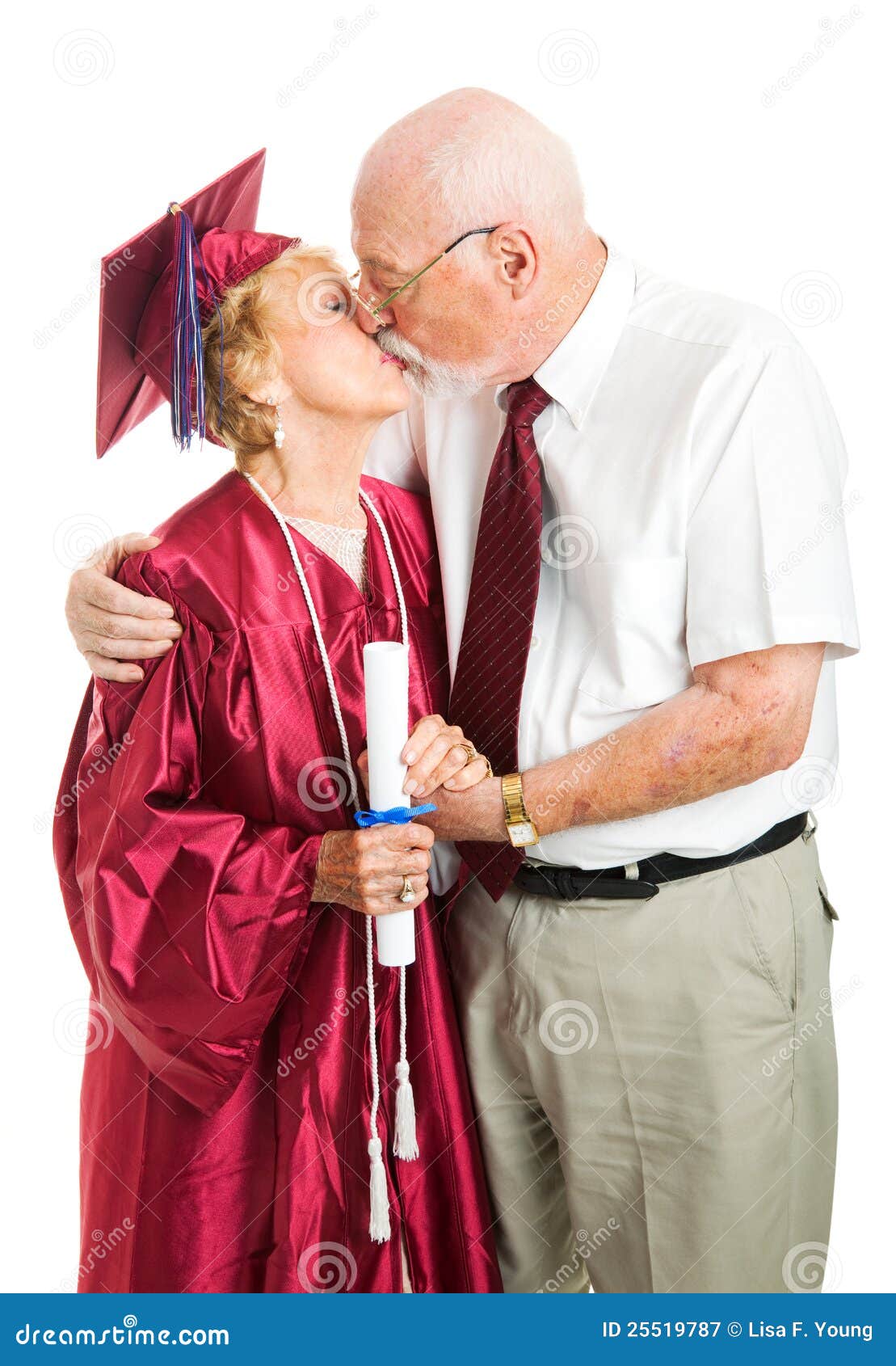 Senior Graduation Couple Kissing Stock Image - Image of robe ...