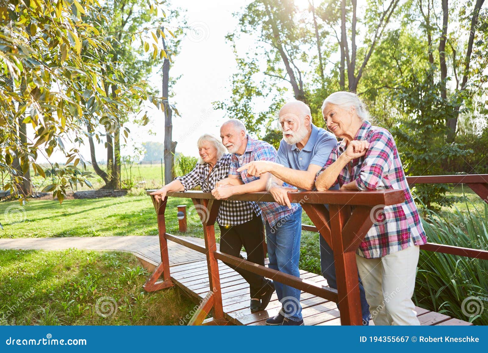Senior Group is Standing on a Small Bridge Stock Image - Image of ...