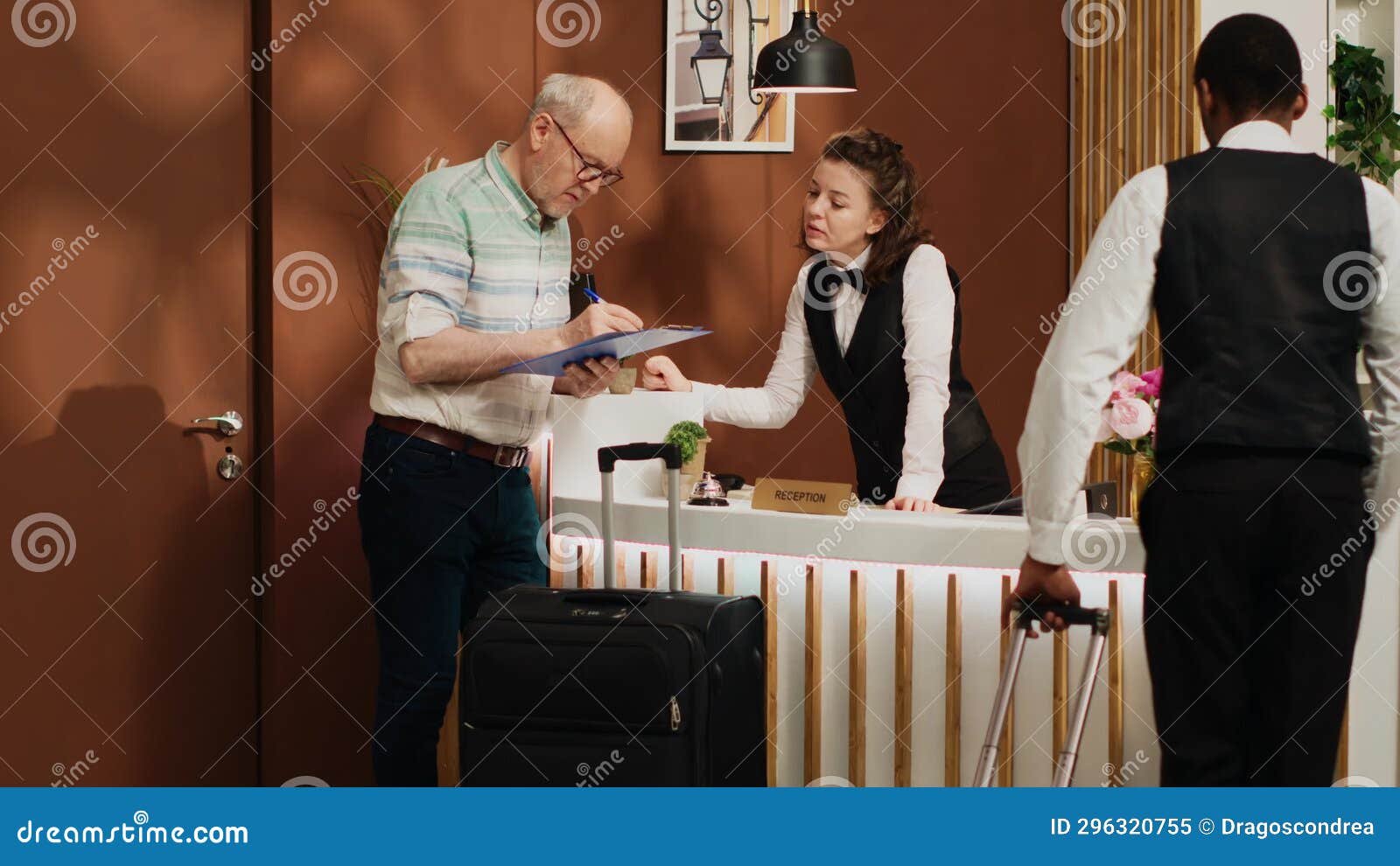 Senior Guy at Front Desk Doing Check in Stock Video - Video of resort ...