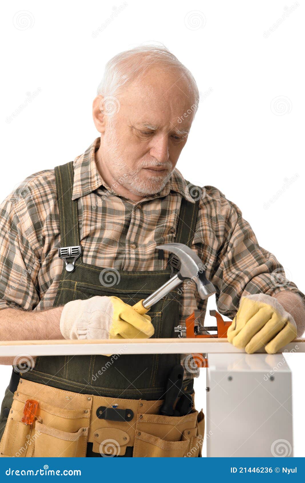 Senior handyman hammering stock photo. Image of face - 21446236