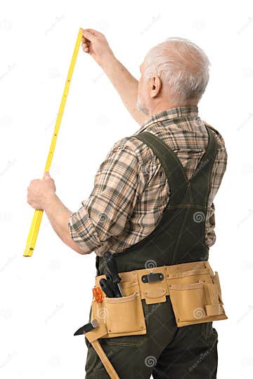 Senior handyman measuring stock image. Image of boomer - 16276737