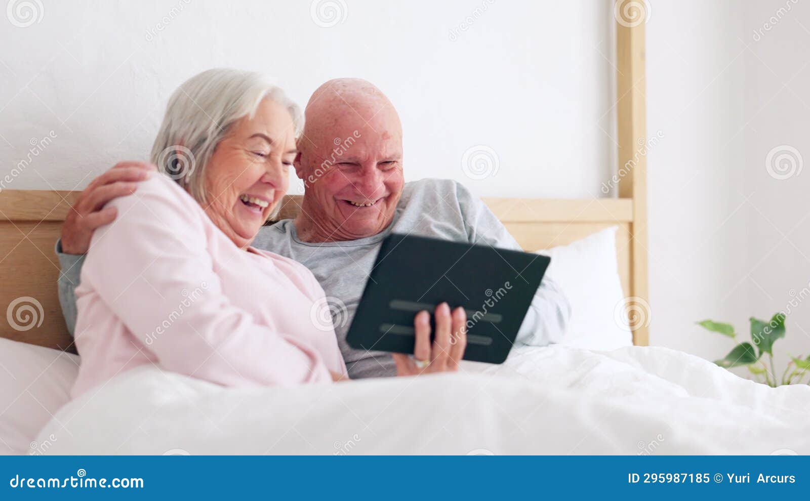 Senior Happy Couple And Tablet For Fun In Bedroom With Social Media