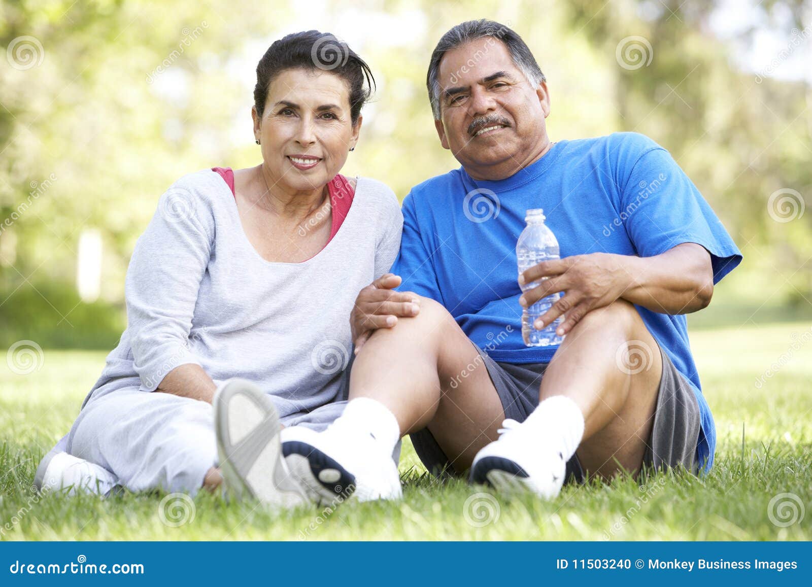 Senior Hispanic Couple Resting after Exercise Stock Photo - Image of ...