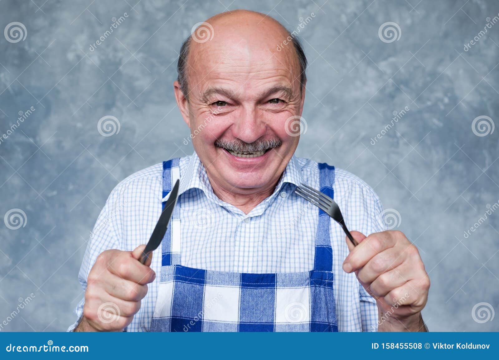 Senior Hispanic Hungry Man Holding a Fork and a Knife. Stock Photo ... Senior Hispanic Hungry Man Holding a Fork and a Knife. Stock Photo ...