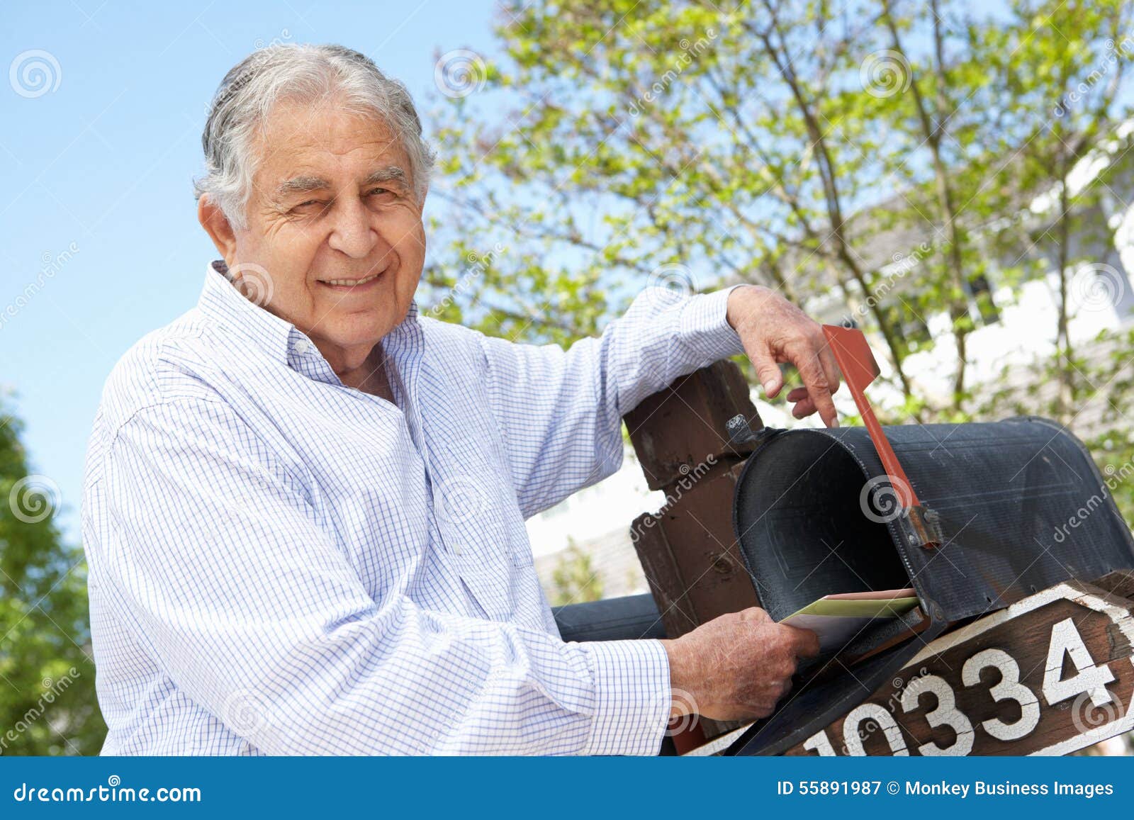Senior Hispanic Man Checking Mailbox Stock Image - Image of person ...
