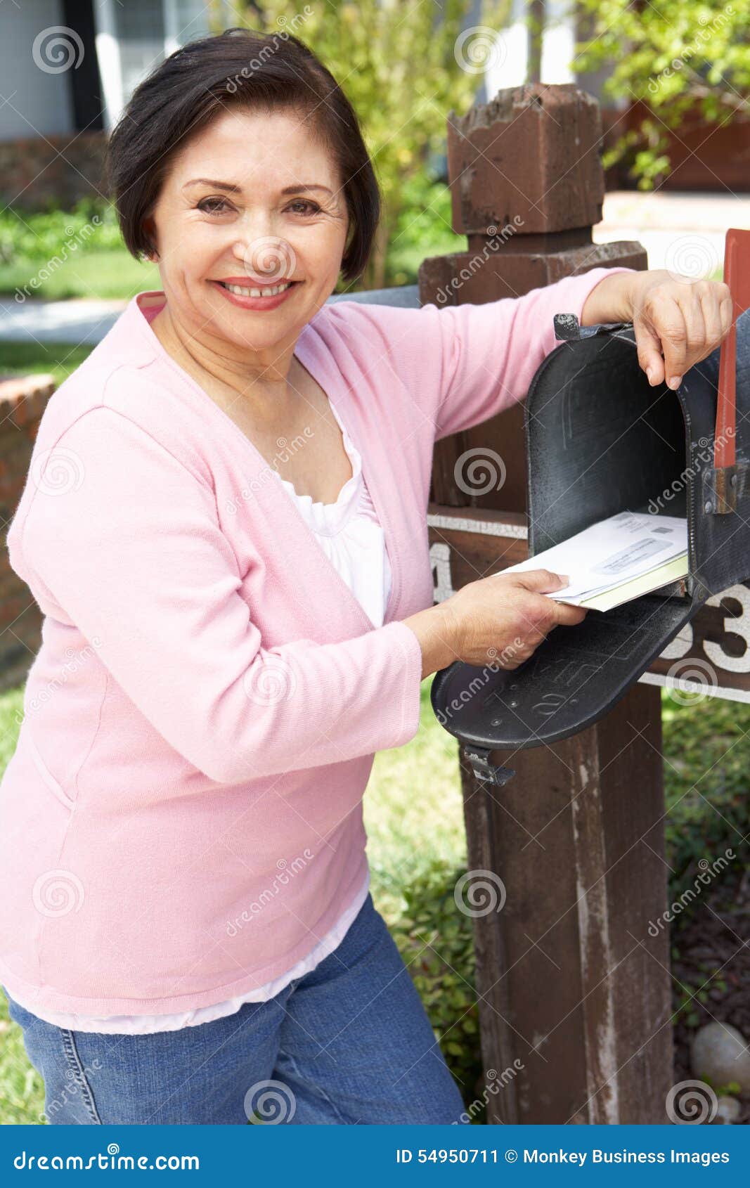 Senior Hispanic Woman Checking Mailbox Stock Image - Image of home ...
