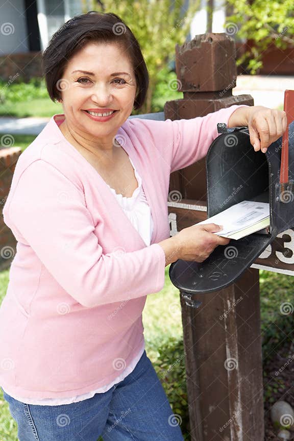 Senior Hispanic Woman Checking Mailbox Stock Image - Image of home, checking: 54950711