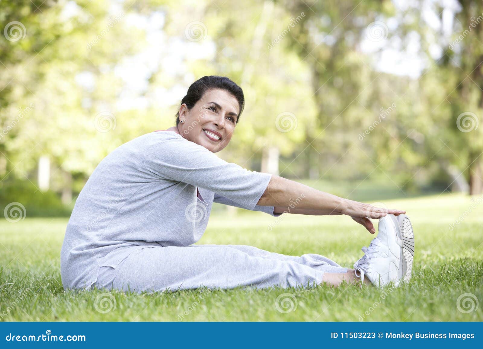 Senior Hispanic Woman Exercising in Park Stock Image - Image of full ...