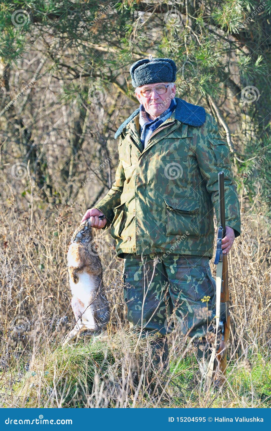 Senior hunter with trophy stock image. Image of adult - 15204595
