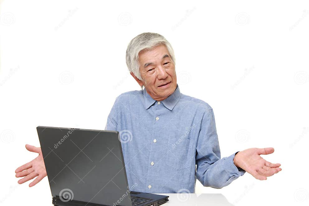 Senior Japanese Man Using Computer Looking Confused Stock Photo - Image ...