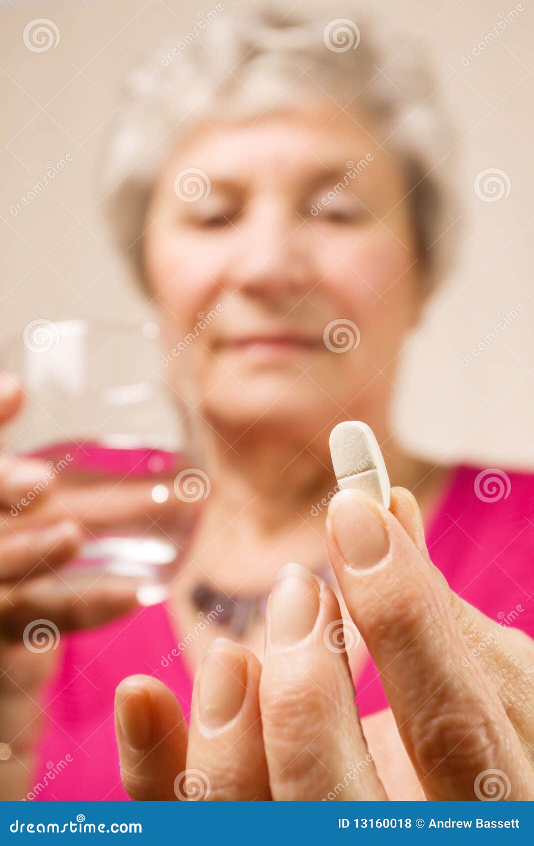 Senior Lady Holding Tablet or Pill with Water Stock Photo - Image of ...