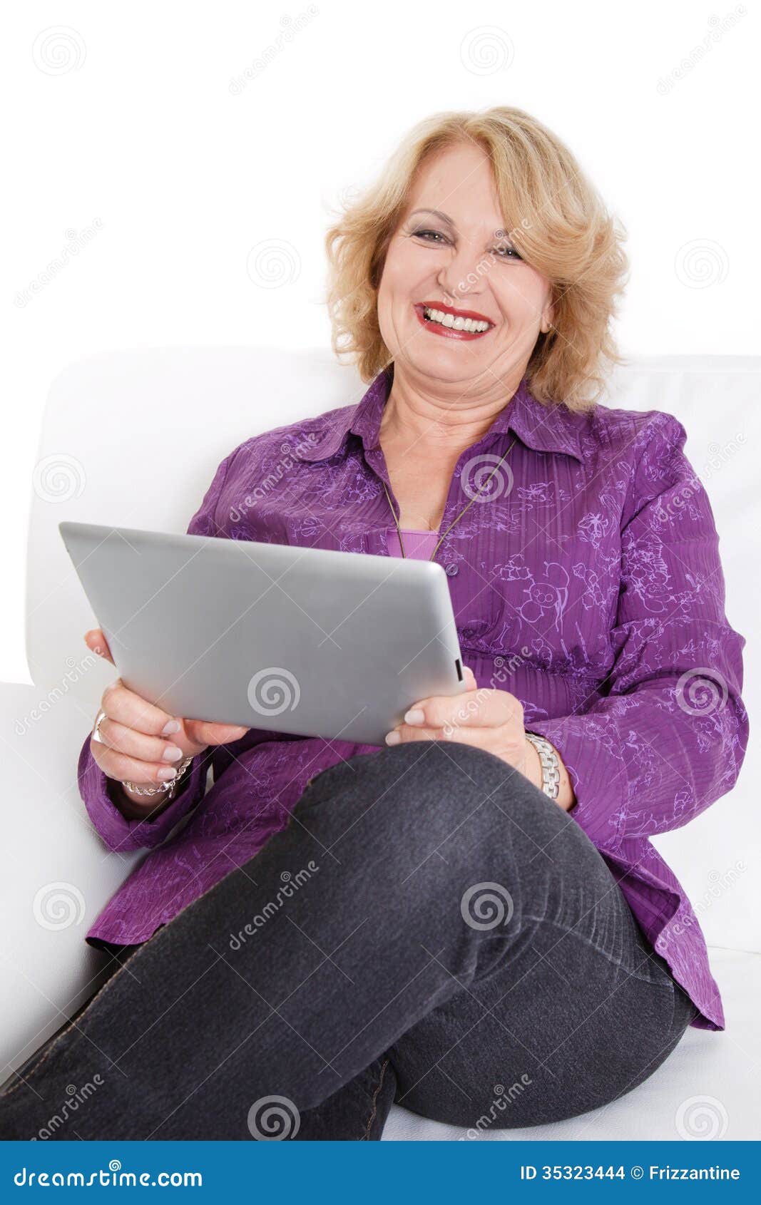 Senior lady reading e-book stock photo. Image of older - 35323444