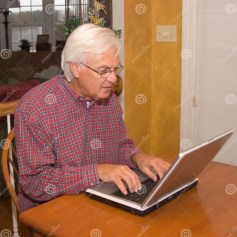 Senior on Laptop stock photo. Image of inquisitive, gray - 1521246