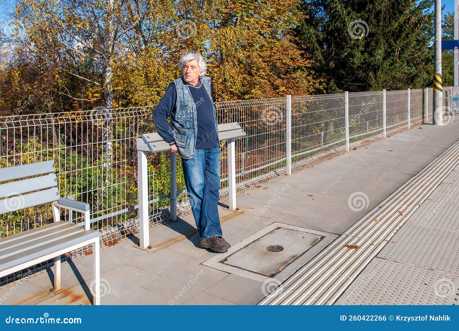 Senior Leaning on a Lean Bench Waiting for a Train on a Platform Stock ...