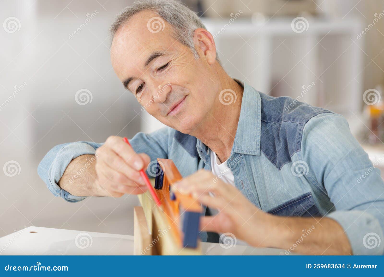 Senior Male Carpenter Using Level on Wood Board Stock Photo - Image of ...