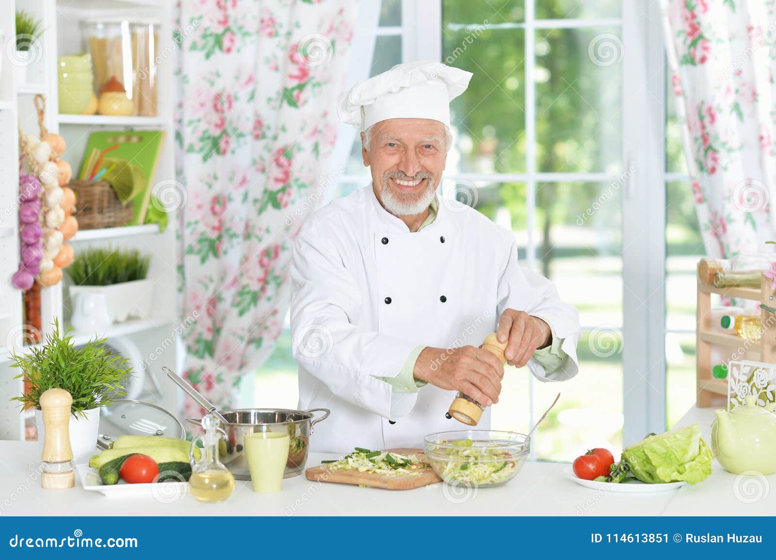 Chef preparing dinner stock image. Image of expression - 114613851