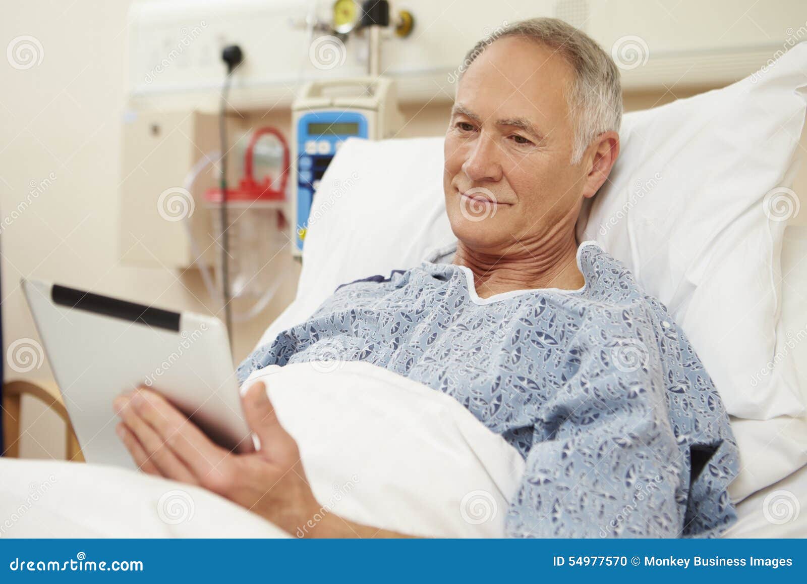 Senior Male Patient Using Digital Tablet in Hospital Bed Stock Photo ...