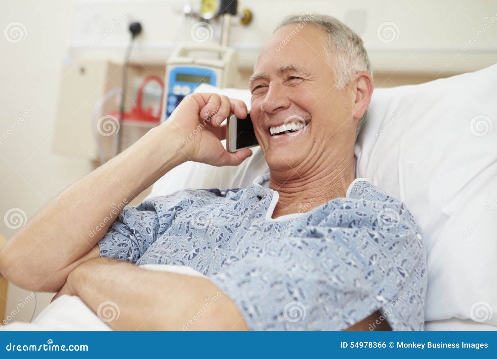 Senior Male Patient Using Mobile Phone in Hospital Bed Stock Photo ...