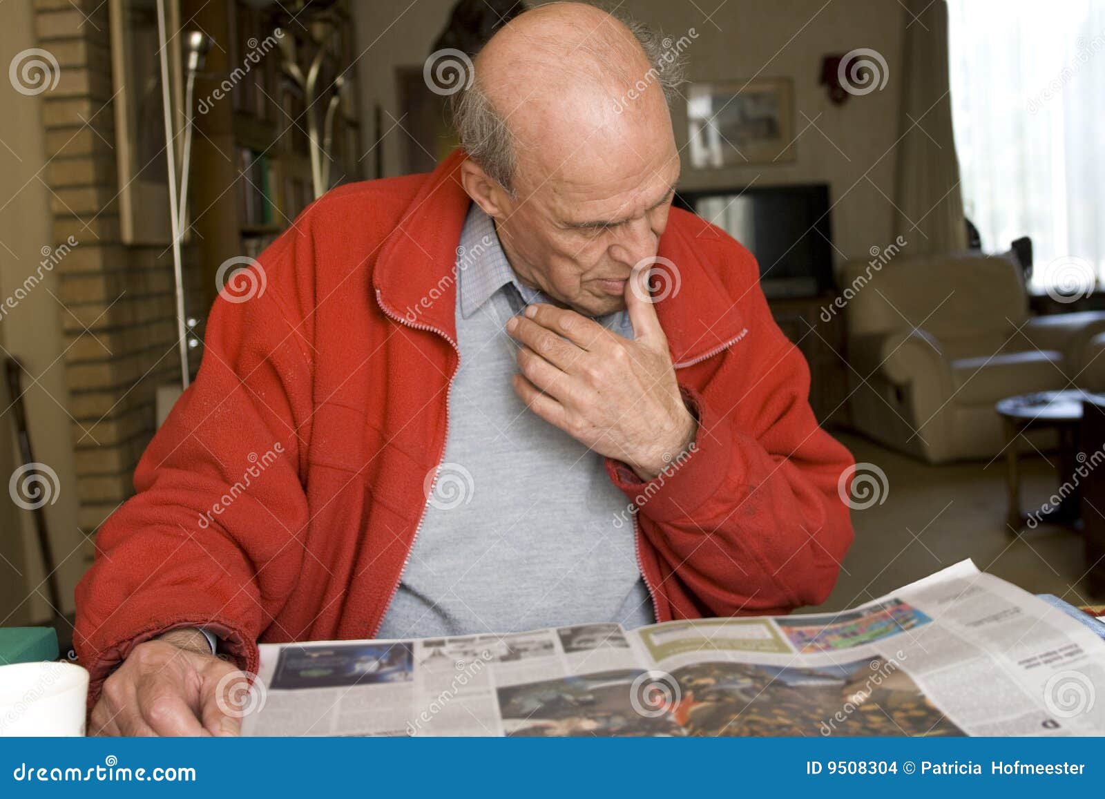 Senior Male Reading Newspaper in His Home Stock Photo - Image of adult ...