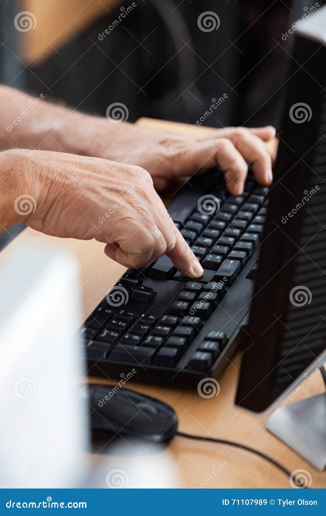 Senior Male Student Using Computer in Classroom Stock Image - Image of ...